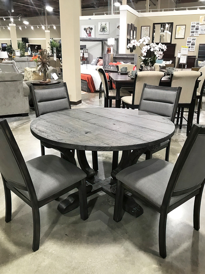 This rustic dining table isn't just furniture—it's where family legends will be born, between passed potatoes and heated Monopoly tournaments.