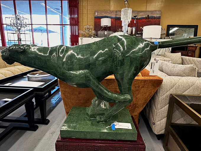 A jade panther sculpture that would make even the most minimalist decorator think, "Yes, I absolutely need a sprinting big cat in my living room."