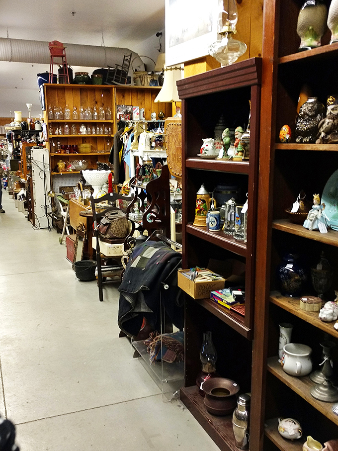 These aren't shelves—they're time capsules. From salt-glazed crocks to delicate figurines, every inch offers a different decade's treasures.