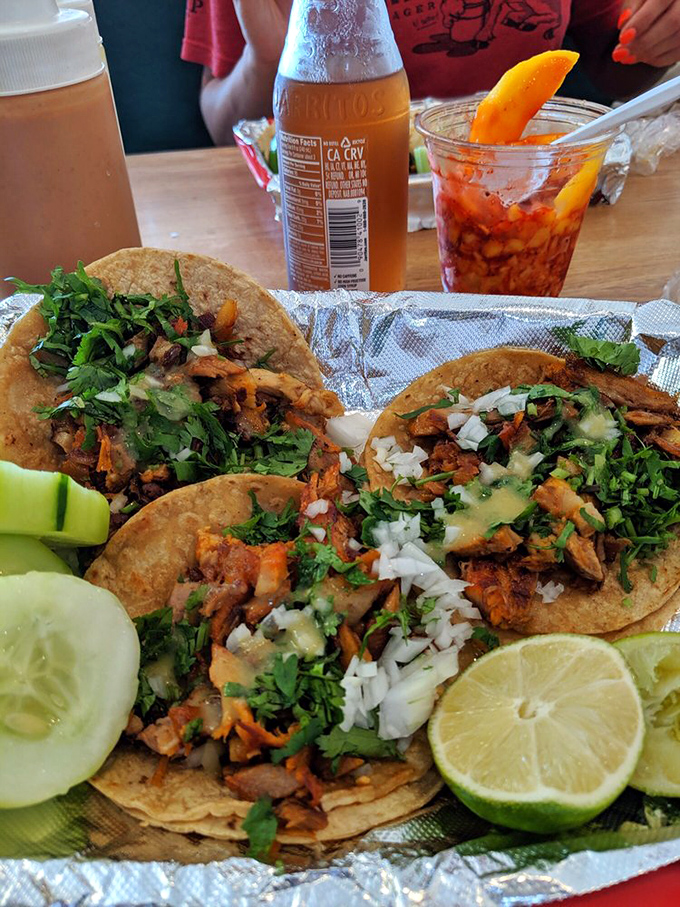 The mark of authentic street tacos: double corn tortillas, minimal toppings, and meat that doesn't need to hide behind a mountain of cheese.