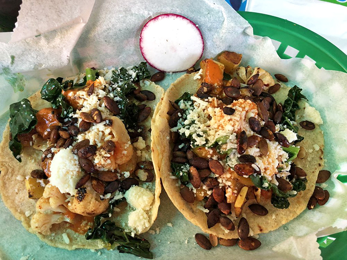 Veggie tacos that could convert carnivores. Those pickled onions add a pop of color and tang that makes everything sing. 