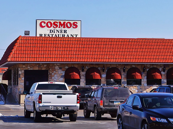 Cosmos Diner's distinctive stone facade and red roof make architectural promises that the menu inside absolutely keeps.