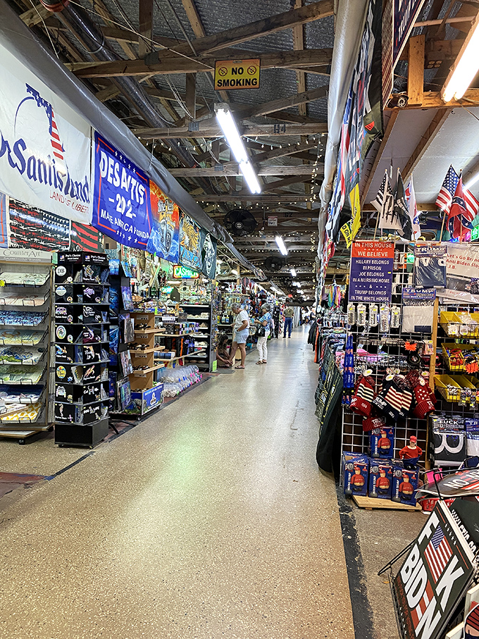 Flags flying, deals waiting. Daytona's market proves shopping is still an all-American adventure under those rustic rafters.