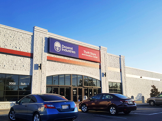 Deseret Industries' clean stone exterior and illuminated sign transform thrift shopping into a department store experience.
