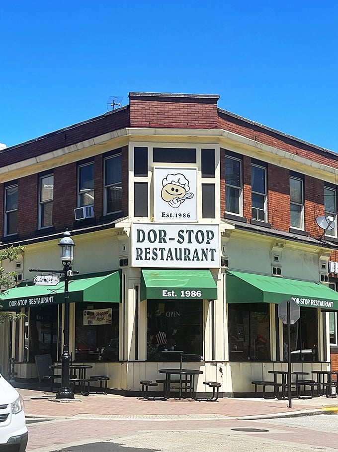Dor-Stop Restaurant (corner view): That cartoon chef has been smiling since 1986, knowing the hotcakes inside will change your breakfast standards forever.