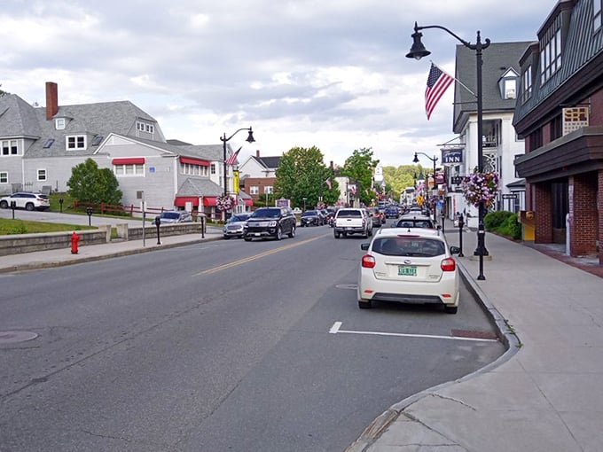Littleton's riverside charm captivates visitors with its perfect blend of natural beauty and small-town character. That water wheel is just showing off.
