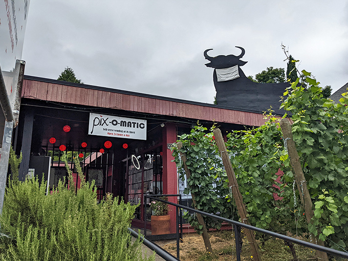 Pix-O-Matic's distinctive red exterior with its whimsical cow mascot &ndash; dessert automation at its finest. 