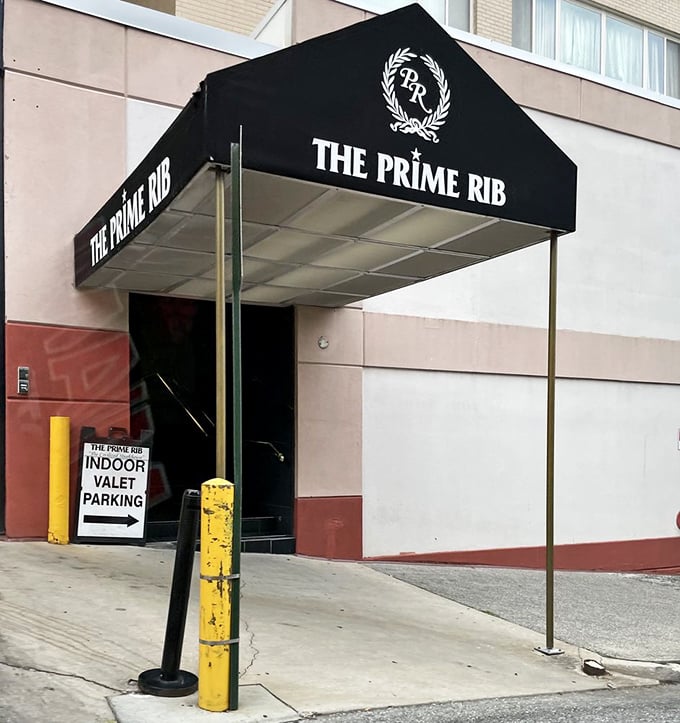 The Prime Rib's elegant awning is your first clue that dinner here is an event, not just a meal. Classic steakhouse glamour awaits.