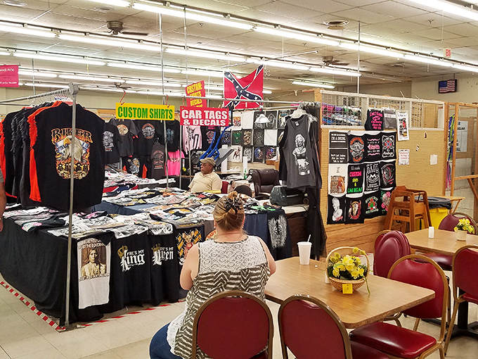 T-shirts and memorabilia line the walls at Admiral Flea Market. It's like a museum where you can take the exhibits home!