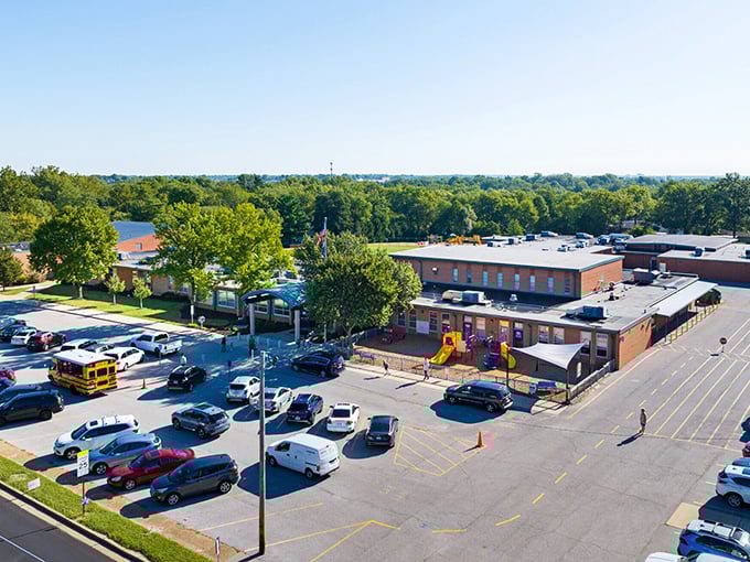 A schoolyard anchors this Ballwin neighborhood, creating a multi-generational community. Nearby homes enjoy tree-lined streets and that safe, suburban feeling many retirees crave.