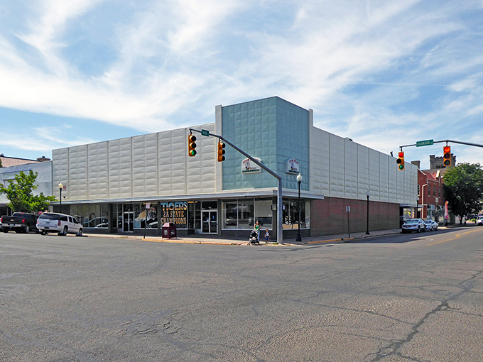 Sunny La Junta streets invite you to explore local history past colorful murals and vintage storefronts under a bright sky.