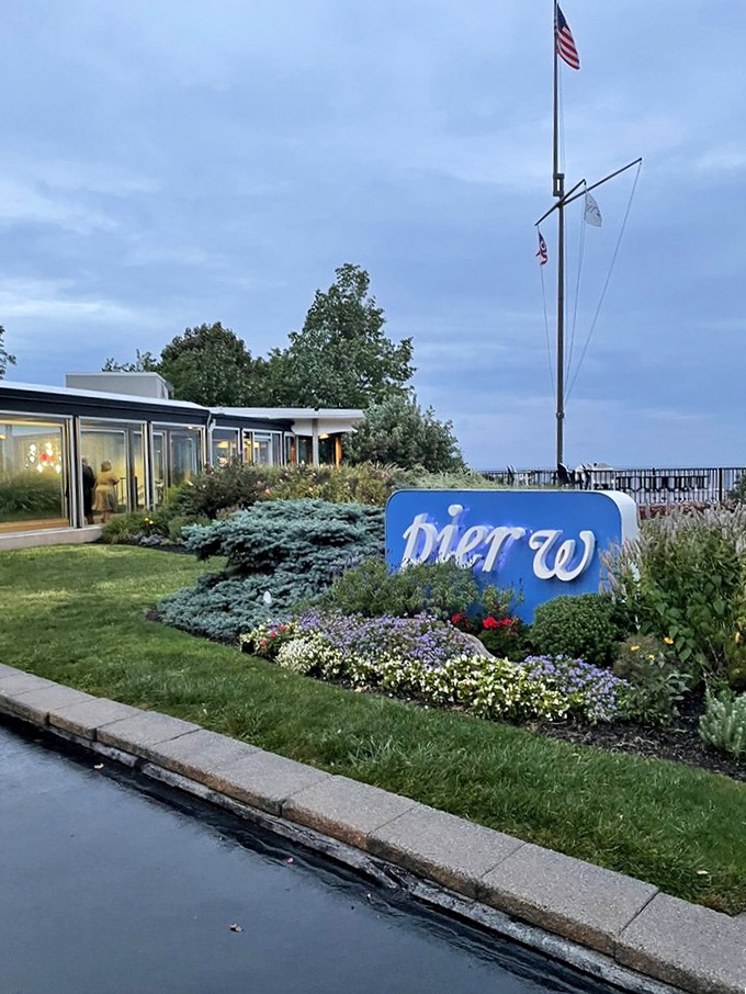 Pier W: Where land meets water in dramatic fashion. The sleek lines and waterfront setting create the perfect backdrop for seafood that shines.