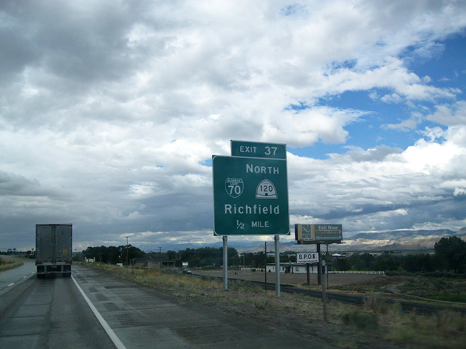 Richfield's highway sign points the way to one of Utah's most affordable retirement destinations, where your Social Security check stretches further.