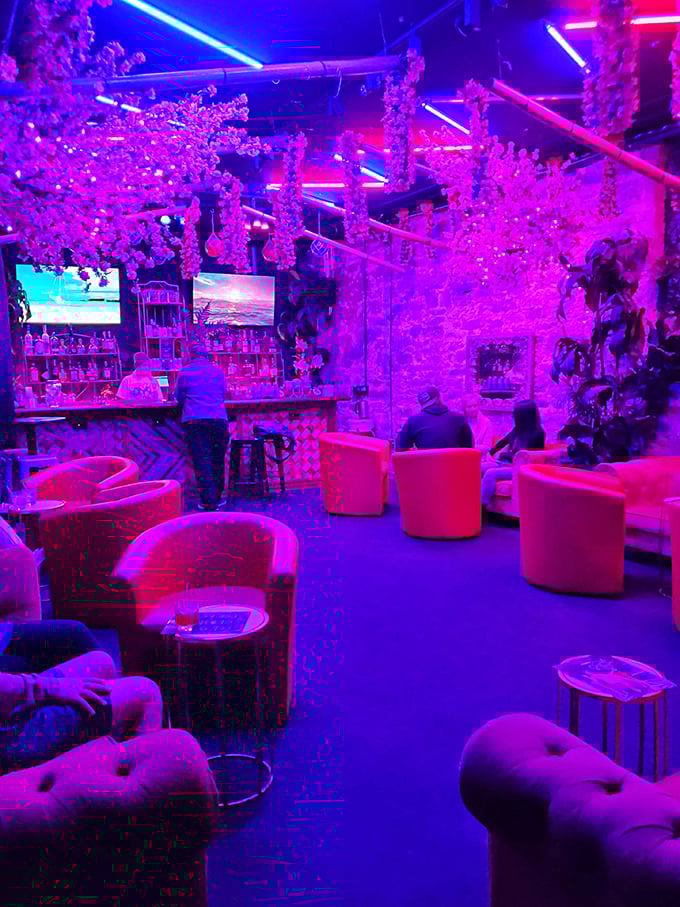 Pink chairs, purple lights, and tropical vibes create Columbus's most Instagram-worthy cocktail escape.