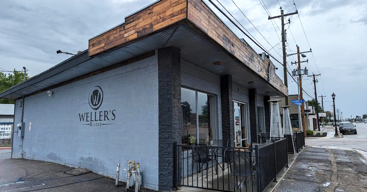 The unassuming exterior of Weller's Bistro proves once again that culinary treasures often hide behind modest facades. That wooden accent though? Pure rustic charm.