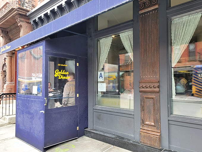 The royal blue awning of Golden Diner stands out like a beacon of breakfast hope on this unassuming Chinatown corner.