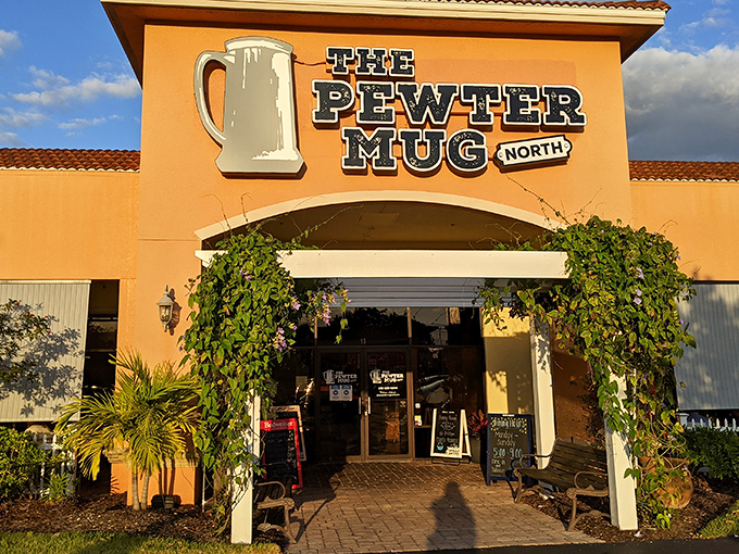 The warm terracotta exterior of The Pewter Mug North stands as Naples' worst-kept secret, where prime rib enthusiasts make their pilgrimage beneath that iconic pewter mug sign.