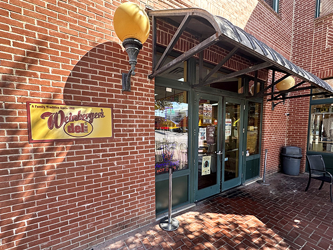 A beacon of deliciousness! Weinberger's Deli's inviting exterior promises sandwich nirvana, with its warm glow beckoning hungry souls like a siren's call to carb-lovers.