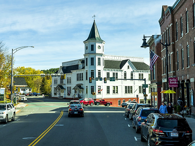 Main Street Littleton delivers that perfect small-town vibe where church steeples still punctuate the skyline and American flags flutter with genuine patriotic pride.