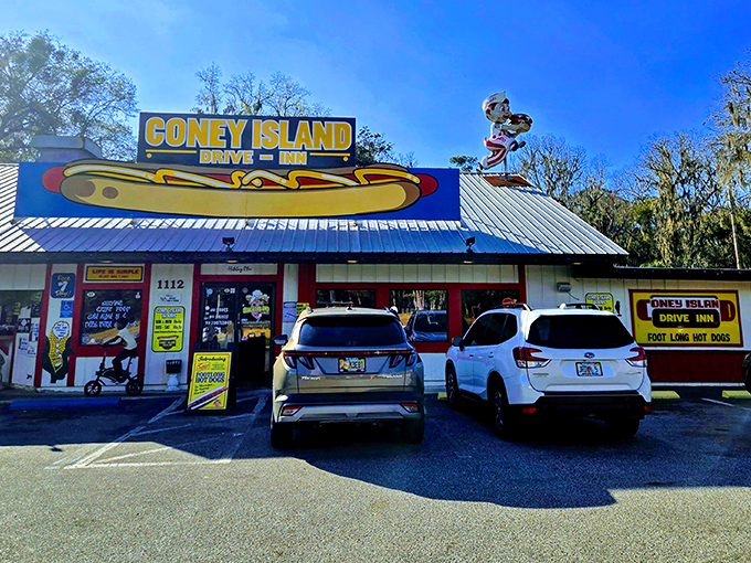 The giant hot dog sign beckons like a neon lighthouse for the hungry. Brooksville's temple to tubular meat awaits!