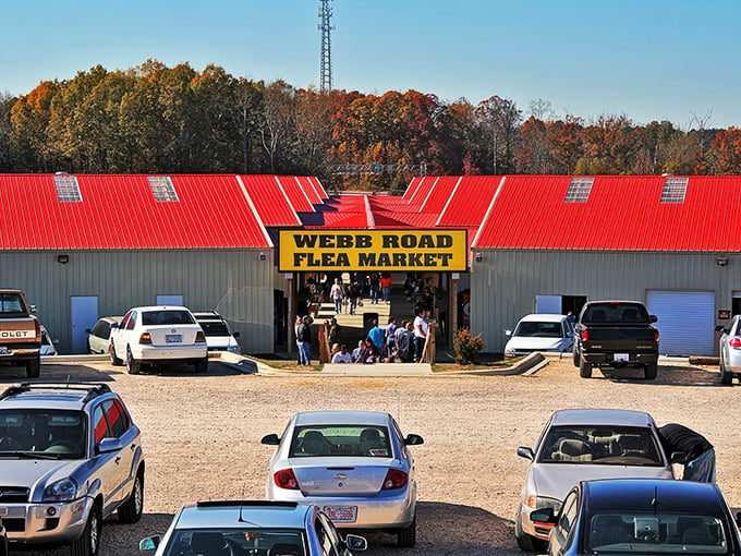 The iconic red-roofed entrance beckons bargain hunters like a retail Shangri-La. Cars fill the lot as shoppers prepare for treasure-hunting adventures.