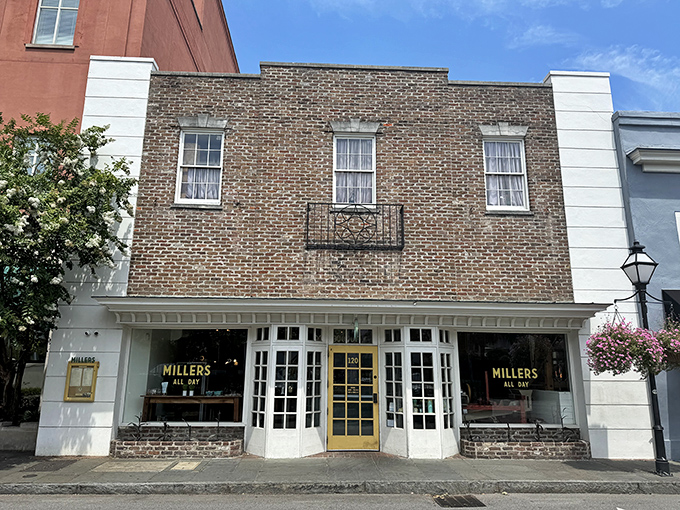The charming storefront of Millers All Day beckons from King Street with its bright yellow door—like Charleston itself, both elegant and welcoming.