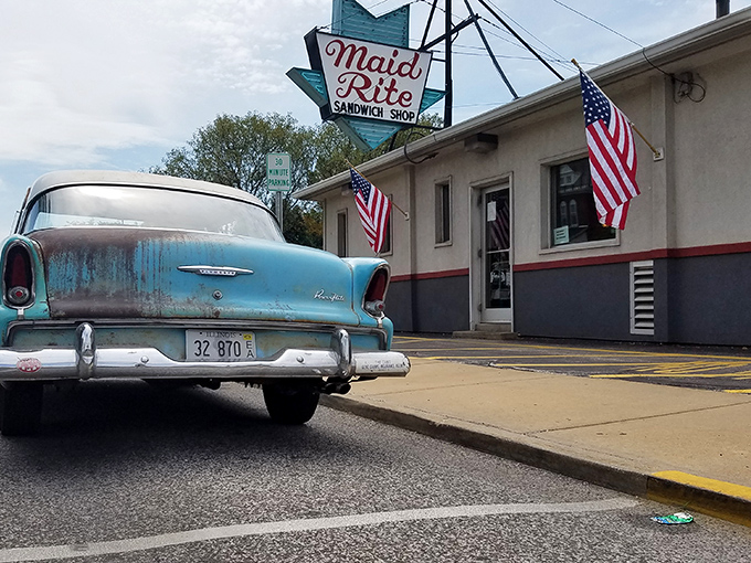 The vintage Maid-Rite sign promises a journey back to simpler times, when sandwiches didn't need Instagram filters to be delicious.