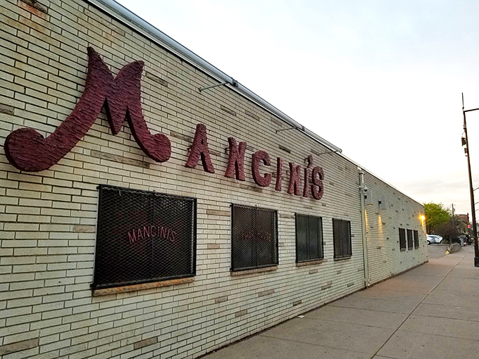 That vintage neon sign isn't just advertising – it's a time machine promising cocktails, steaks, and an evening where calories don't count.