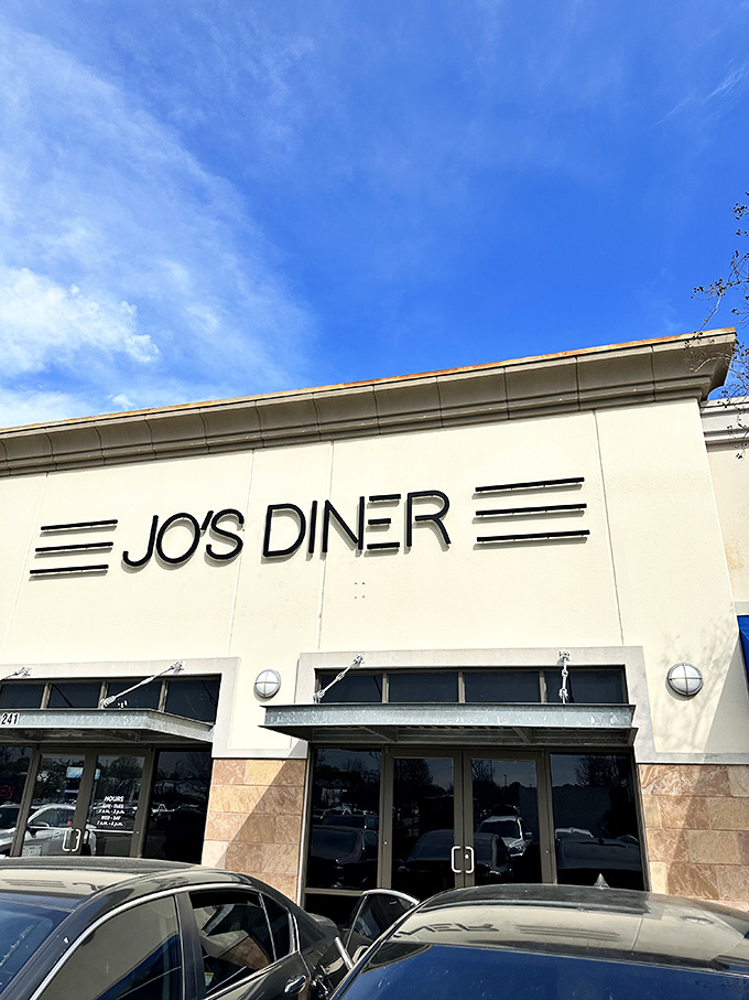 The unassuming exterior of Jo's Diner in Flowood hides a breakfast paradise within. That blue and white sign promises comfort food glory that delivers every time.