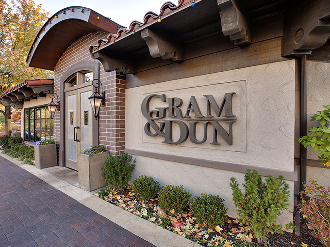 The Spanish-inspired fa&ccedil;ade of Gram & Dun welcomes hungry pilgrims to Kansas City's Country Club Plaza, where culinary magic awaits behind those elegant windows. 