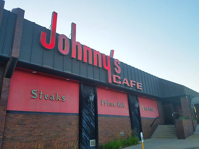 Johnny's bold red signage stands like a time machine in South Omaha, promising carnivorous delights that have satisfied generations of Nebraskans. 