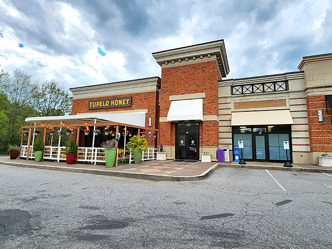 The brick exterior with its cheerful yellow signage feels like a warm Southern invitation you simply can't refuse.