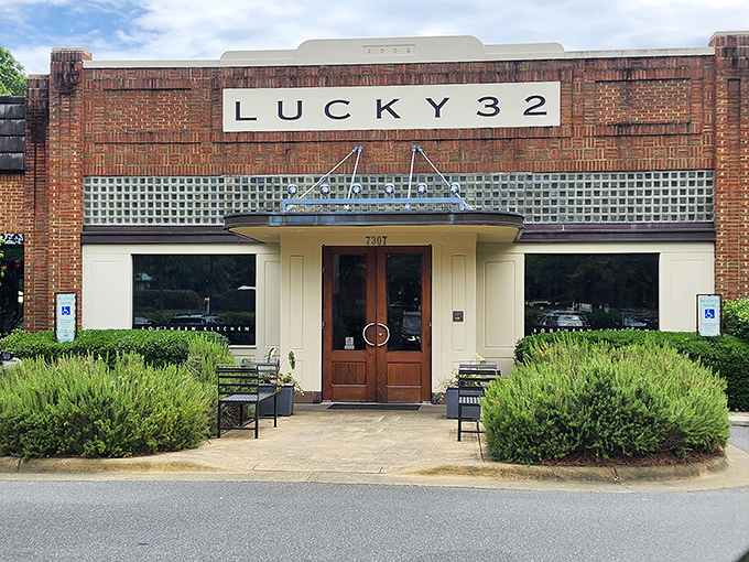 The brick facade of Lucky 32 stands like a Southern sentinel, promising culinary treasures within. No wonder folks make the pilgrimage from across the state.