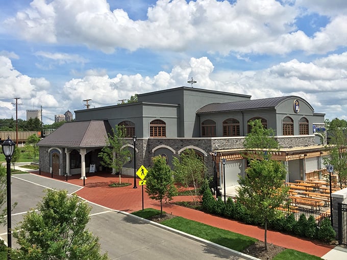 The impressive Bavarian-inspired architecture of Hofbr&auml;uhaus Columbus stands proudly against an Ohio sky, promising authentic German experiences without the transatlantic flight.