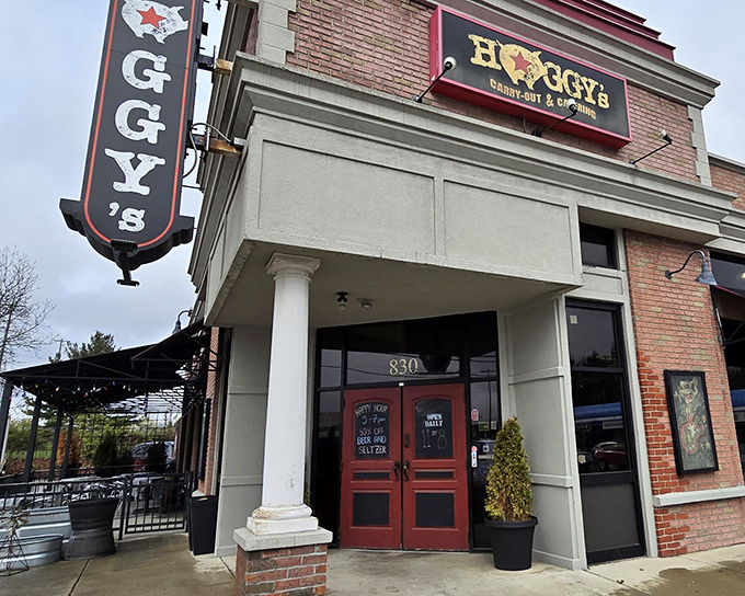 The red door at Hoggy's BBQ isn't just an entrance—it's a portal to smoke-kissed nirvana that Columbus locals have treasured for years.