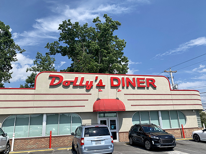 The classic red signage of Dolly's Diner beckons like a lighthouse for the breakfast-starved. This retro exterior promises comfort food without pretension.
