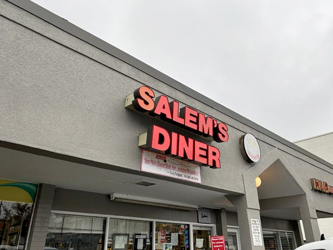 The iconic red signage of Salem's Diner beckons like a lighthouse for the breakfast-deprived. This unassuming storefront houses culinary treasures worth their weight in golden hash browns.