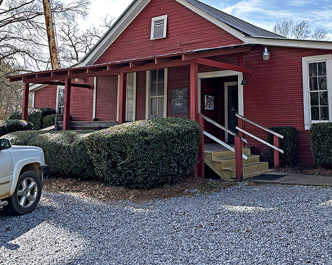 The little red schoolhouse that became a culinary institution stands proudly in Grady, complete with patriotic bunting and a gravel parking lot that's always full at lunchtime.