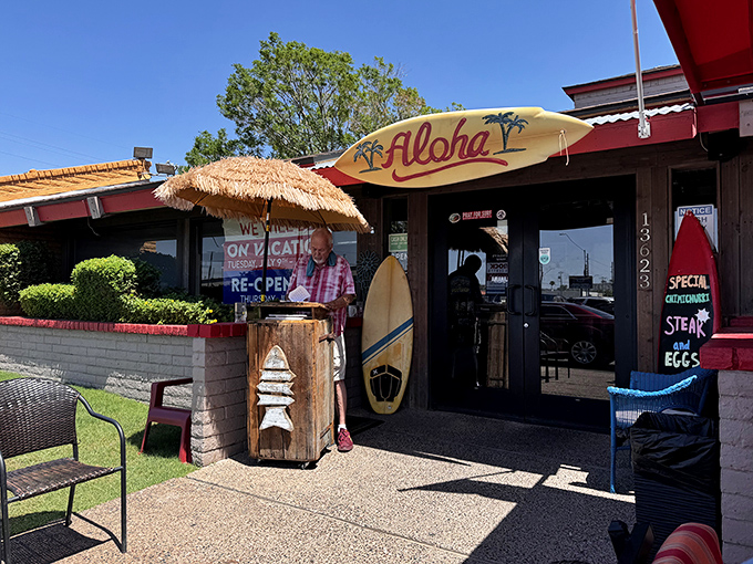 The thatched umbrella and "Aloha" sign promise a tropical escape, while the American flag reminds you this is breakfast patriotism at its finest.
