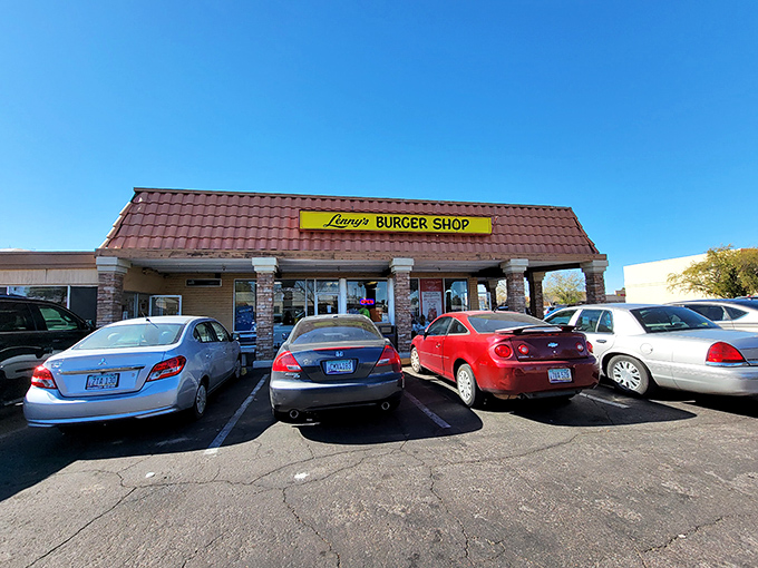 The unassuming terra cotta roof and bright yellow sign promise no frills, just thrills for your taste buds. Arizona's answer to burger paradise.