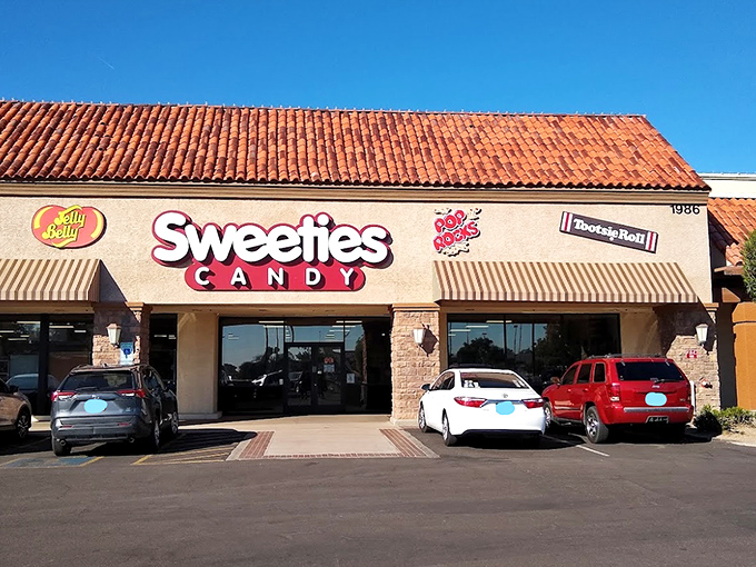 The smiley face logo says it all&mdash;this isn't just a candy store, it's therapy with a sugar rush guarantee.