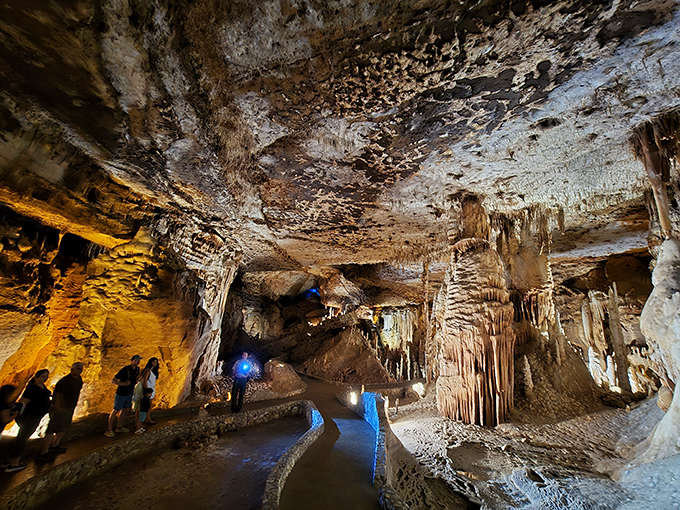 Nature's own light show illuminates this underground cathedral, where stalactites and stalagmites have been playing the world's slowest game of tag for millennia.