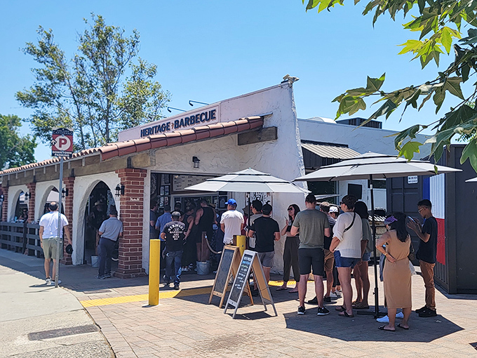 The line forms early at this unassuming white building in San Juan Capistrano, where smoke signals and heavenly aromas telegraph what's waiting inside.