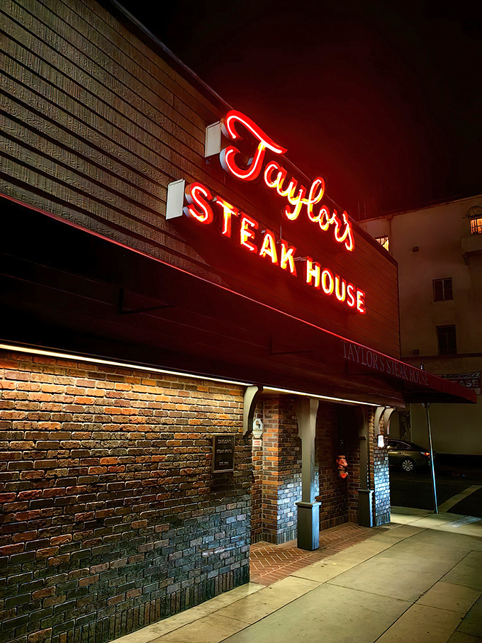 That iconic red neon glow isn't just a sign&mdash;it's a beacon for meat lovers across Los Angeles, promising old-school steakhouse perfection within those brick walls.