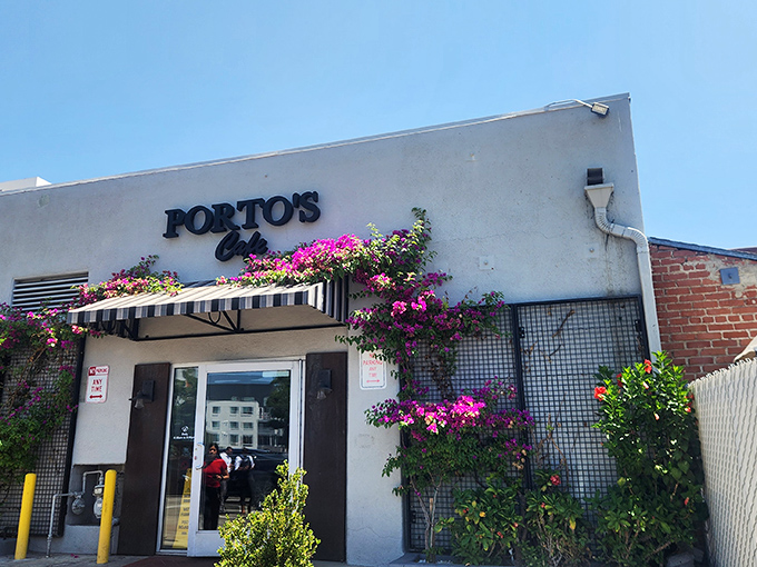 The unassuming exterior of Porto's hides a pastry paradise within. Like finding a secret doorway to dessert nirvana in plain sight.