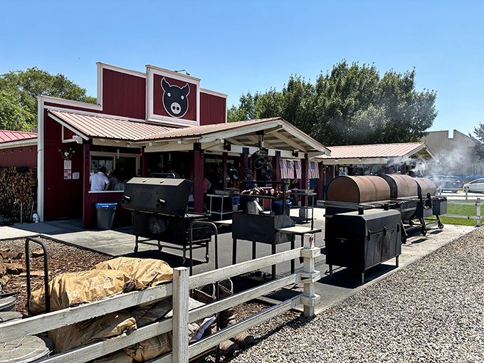 The iconic red barn-like exterior of Copper Top BBQ, where those massive smokers out front aren't just for show&mdash;they're the source of that heavenly aroma that hits you from a quarter-mile away.