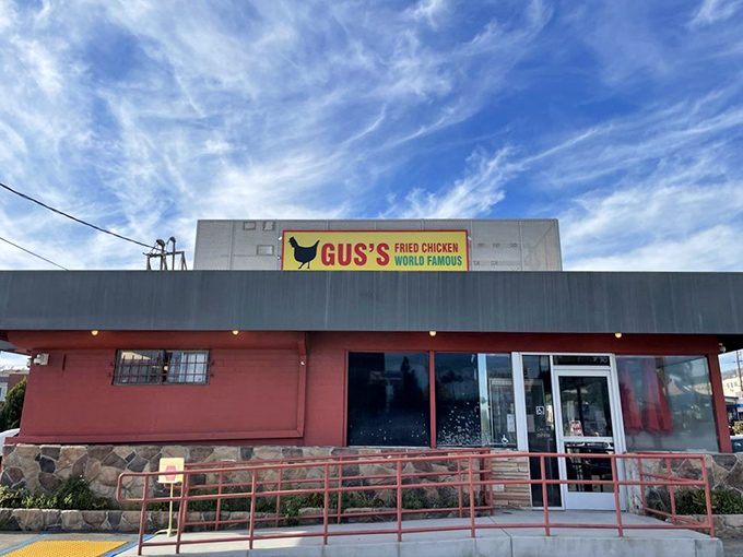 The coral-colored building with its bold yellow sign makes no apologies for its confidence. Like a Southern gentleman declaring his intentions, Gus's announces itself with charming audacity.