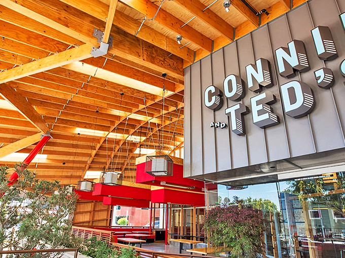 The wave-like roof and bold red beams of Connie and Ted's exterior aren't just architectural showboating&mdash;they're a California love letter to New England seafood traditions.