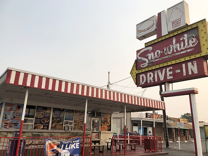 That neon sign isn't just illuminating a parking lot&mdash;it's a beacon calling to burger lovers across Modesto's twilight sky.