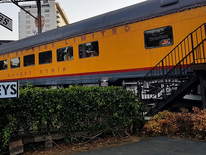 The sunshine-yellow train car of Carney's stands proudly on Sunset Strip, a stationary locomotive that serves up movingly good food.